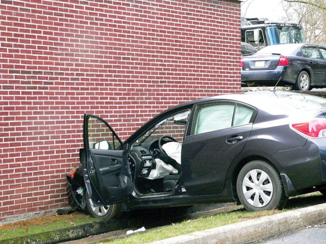 Car strikes building | News, Sports, Jobs - The Sentinel